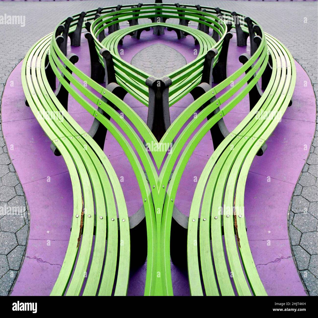 Symmetry outdoor bench merging lines in green and purple Stock Photo ...