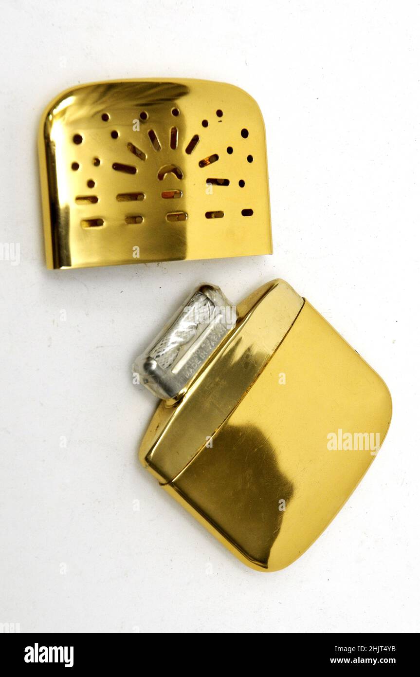 vintage object, pocket warmer Stock Photo - Alamy