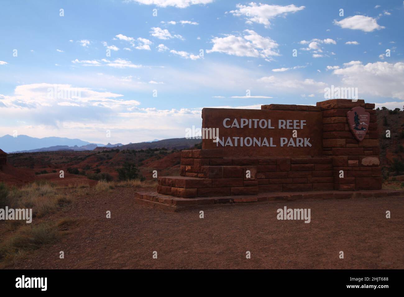Traditional red rocks sign at the entrance of the Capitol Reef National ...