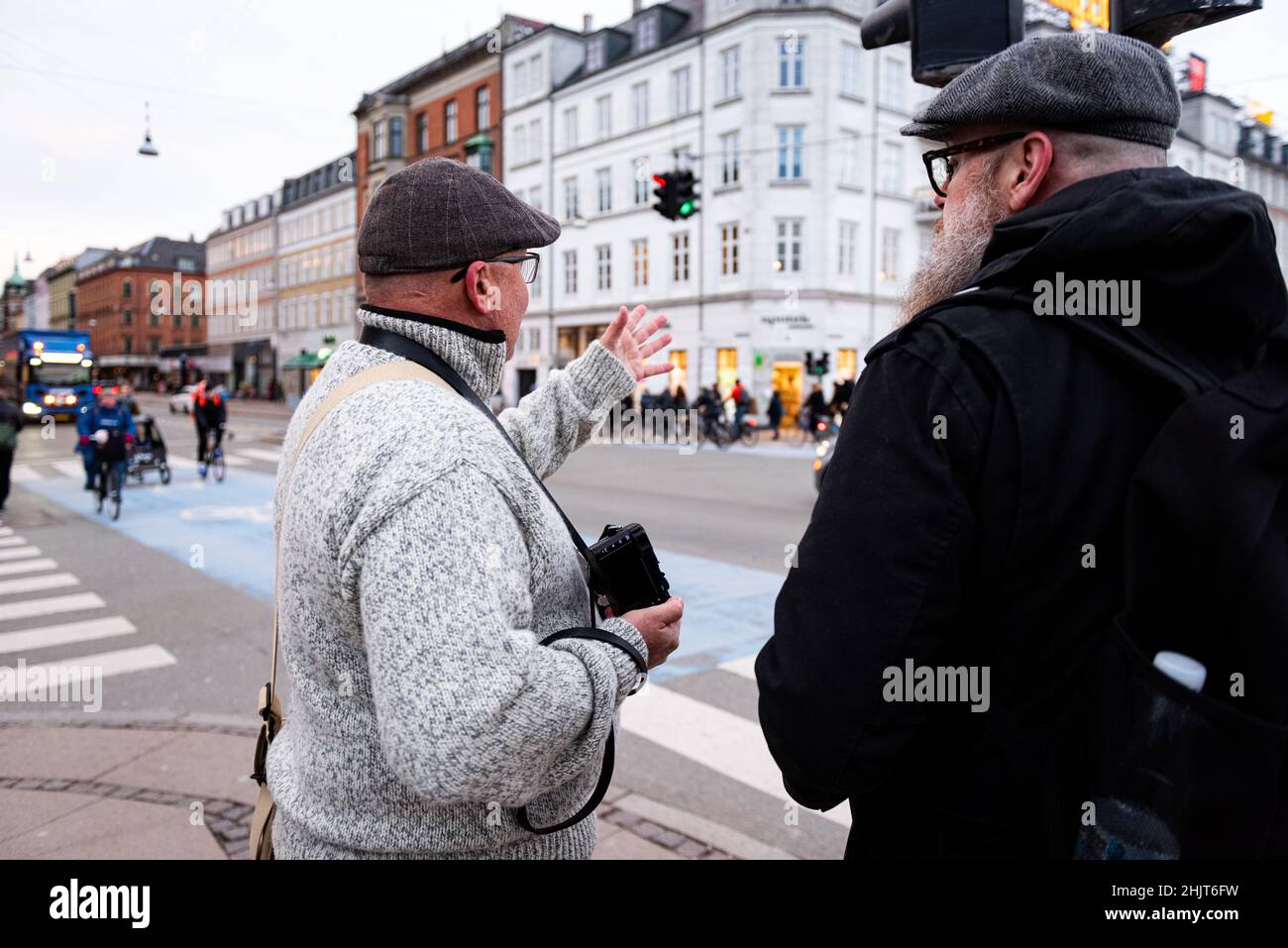 Copenhagen Denmark two men offer to help give directions in the city of ...
