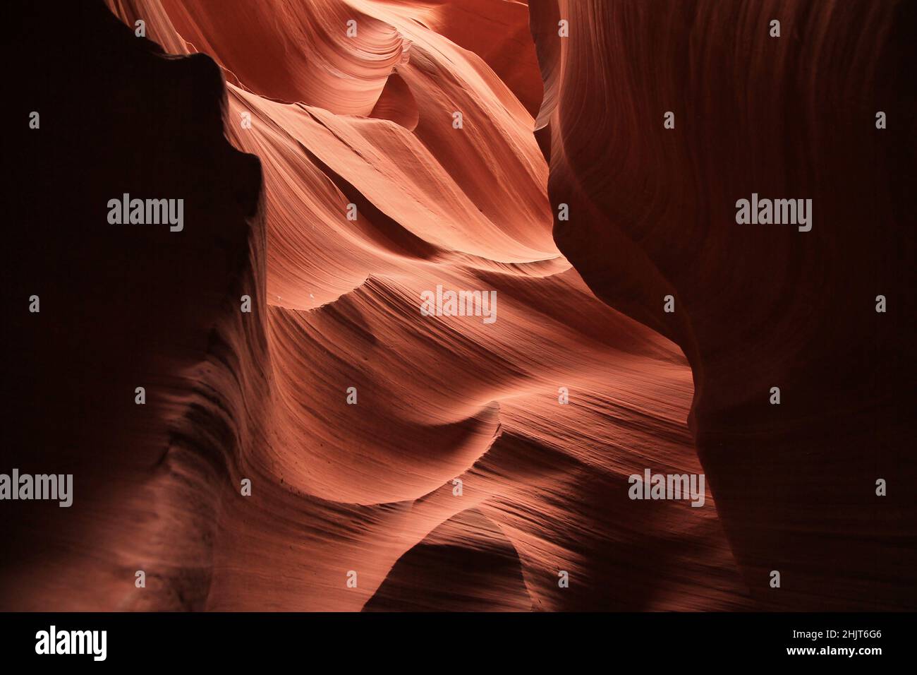 Bumps and dips on the walls of the red rocks of the Antelope Canyon in ...