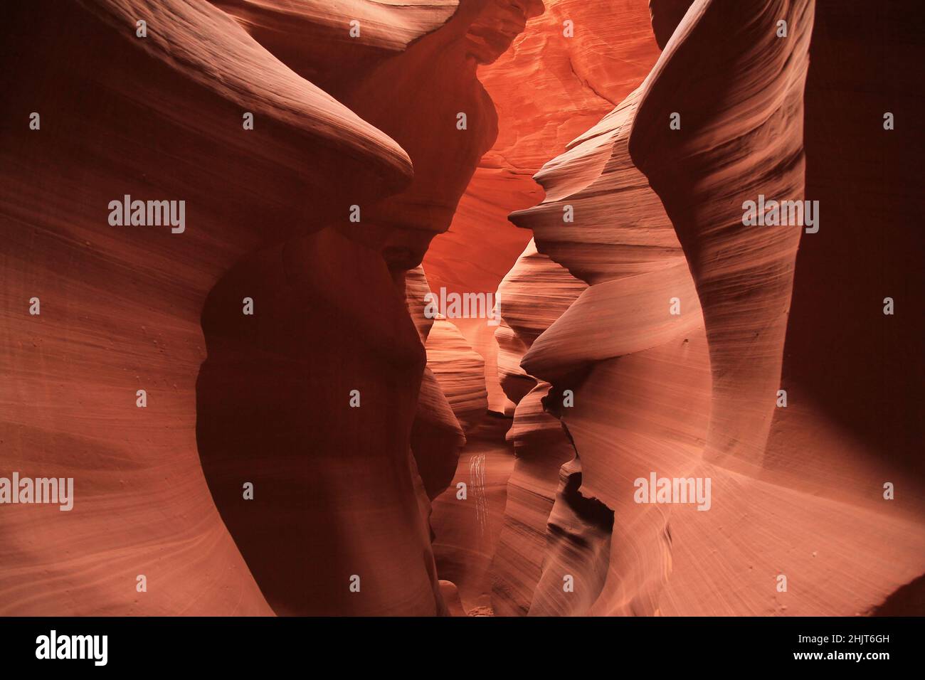 The narrow path surrounded by red walls in the Antelope Canyon in ...