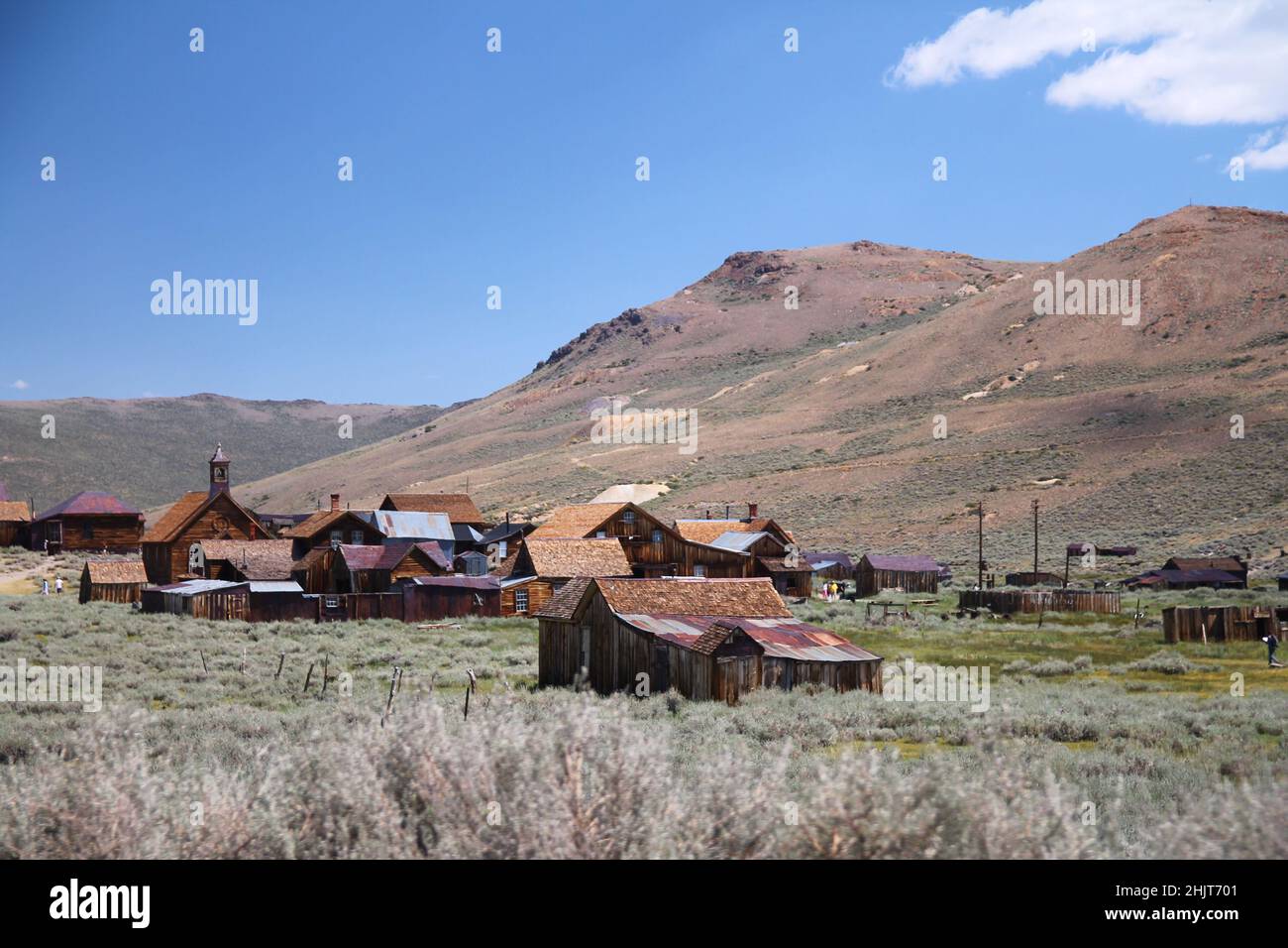 The beautiful ruins of the gold rush city of Bodie with the mountains ...