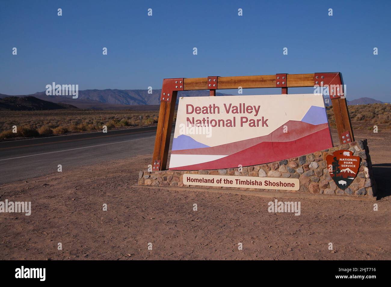 Entrance sign to Death Valley National Park during hot sunset in ...