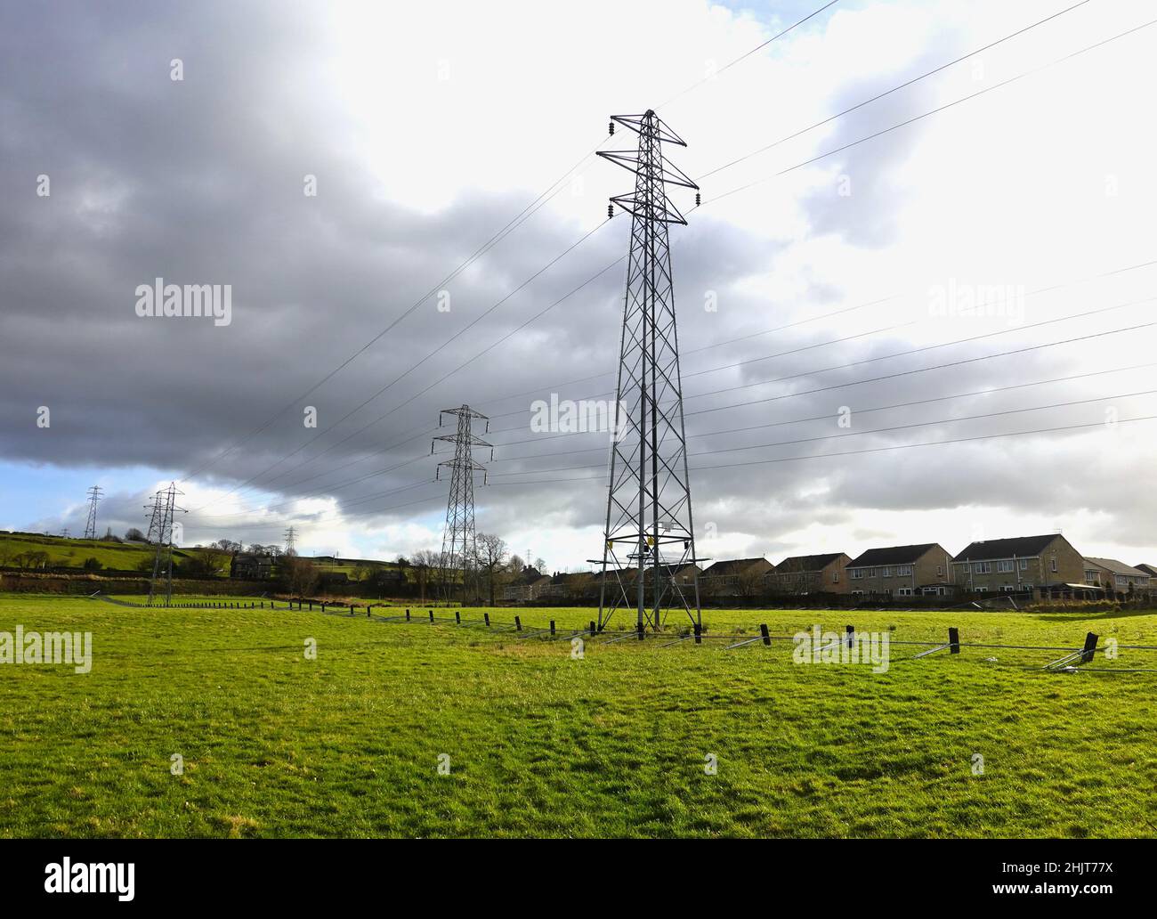 Electricity pylons and houses hi-res stock photography and images - Alamy
