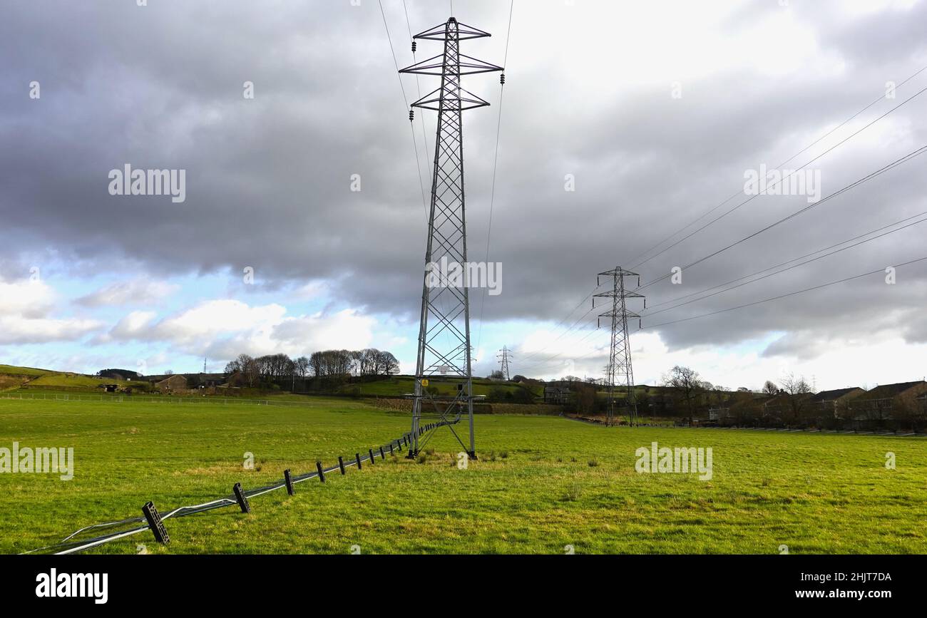 Pylons near housing in New Mills, Derbyshire Stock Photo - Alamy
