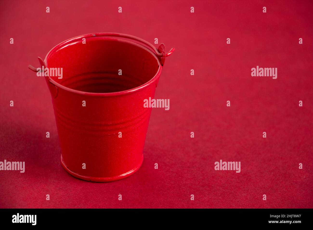 small red food bucket on a red background, stylish and modern Stock ...