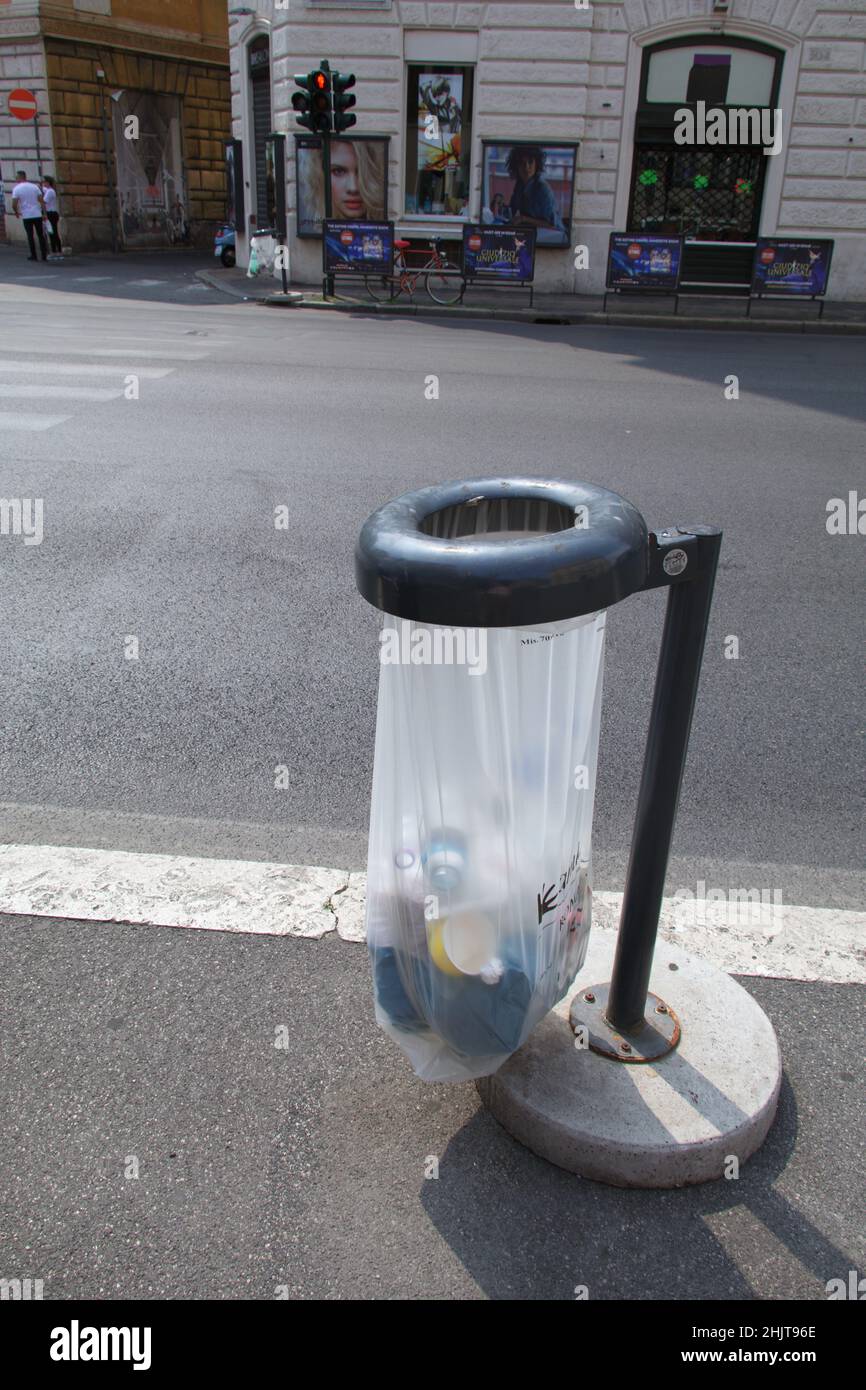 ROME, ITALY – SEPTEMBER 2, 2019: Public trash bins with hanging plastic ...