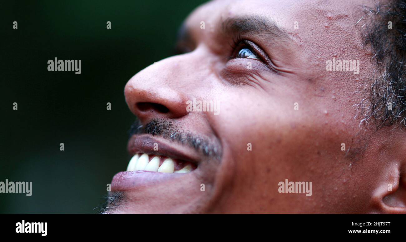 Contemplative person opening eyes in meditation outside in nature Stock ...