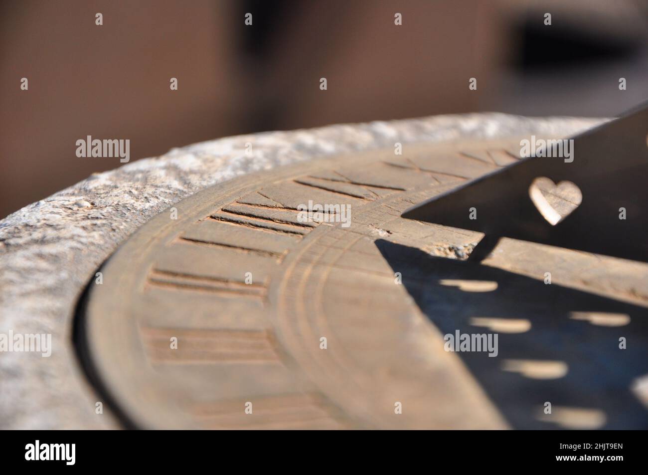 Sun dial with roman numerals Stock Photo - Alamy