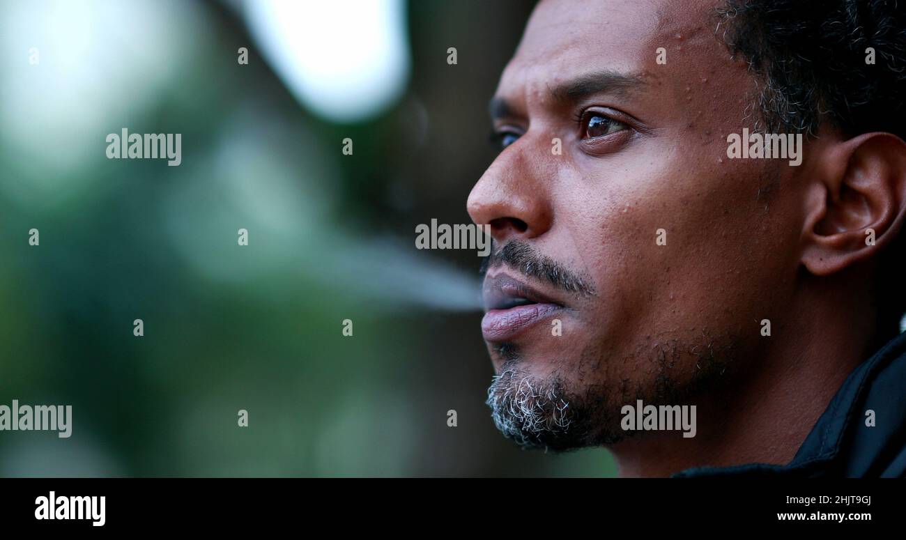 Man exhaling smoke hi-res stock photography and images - Alamy