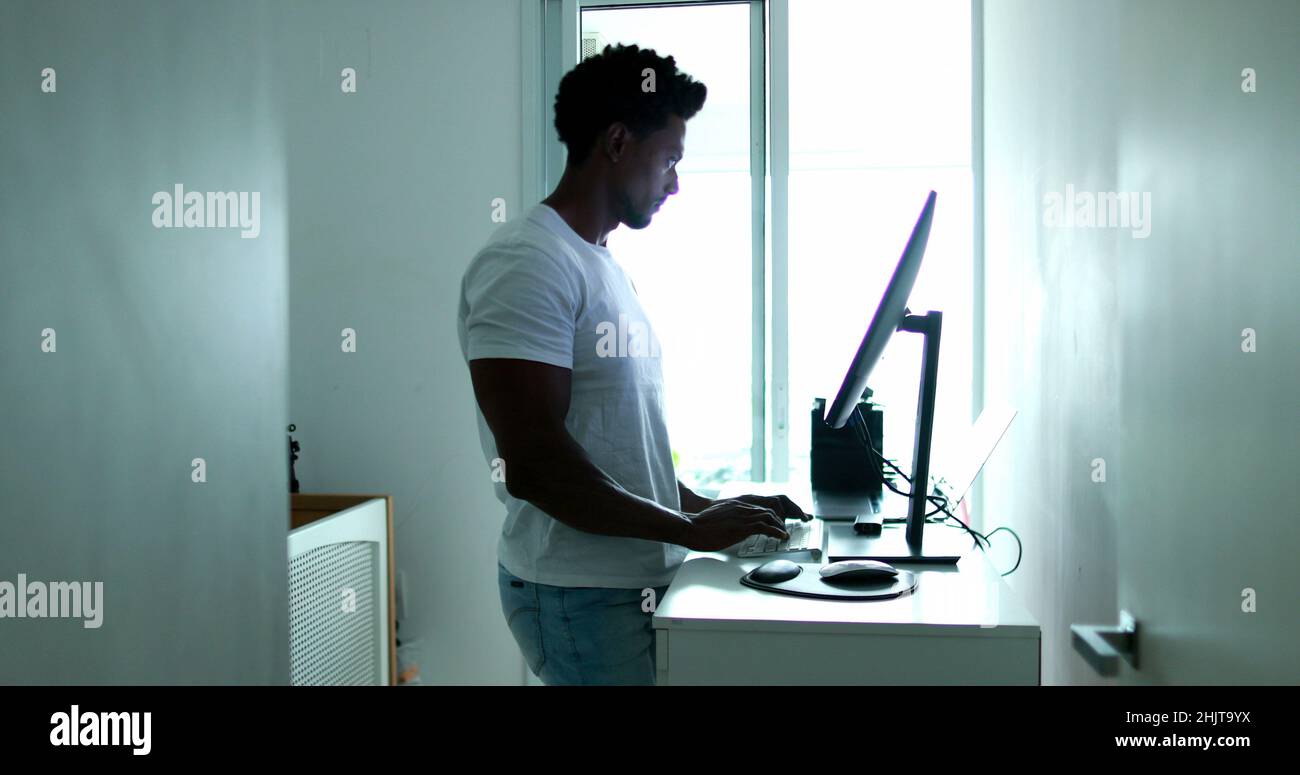 Person working from home with standing desk, black african american ...