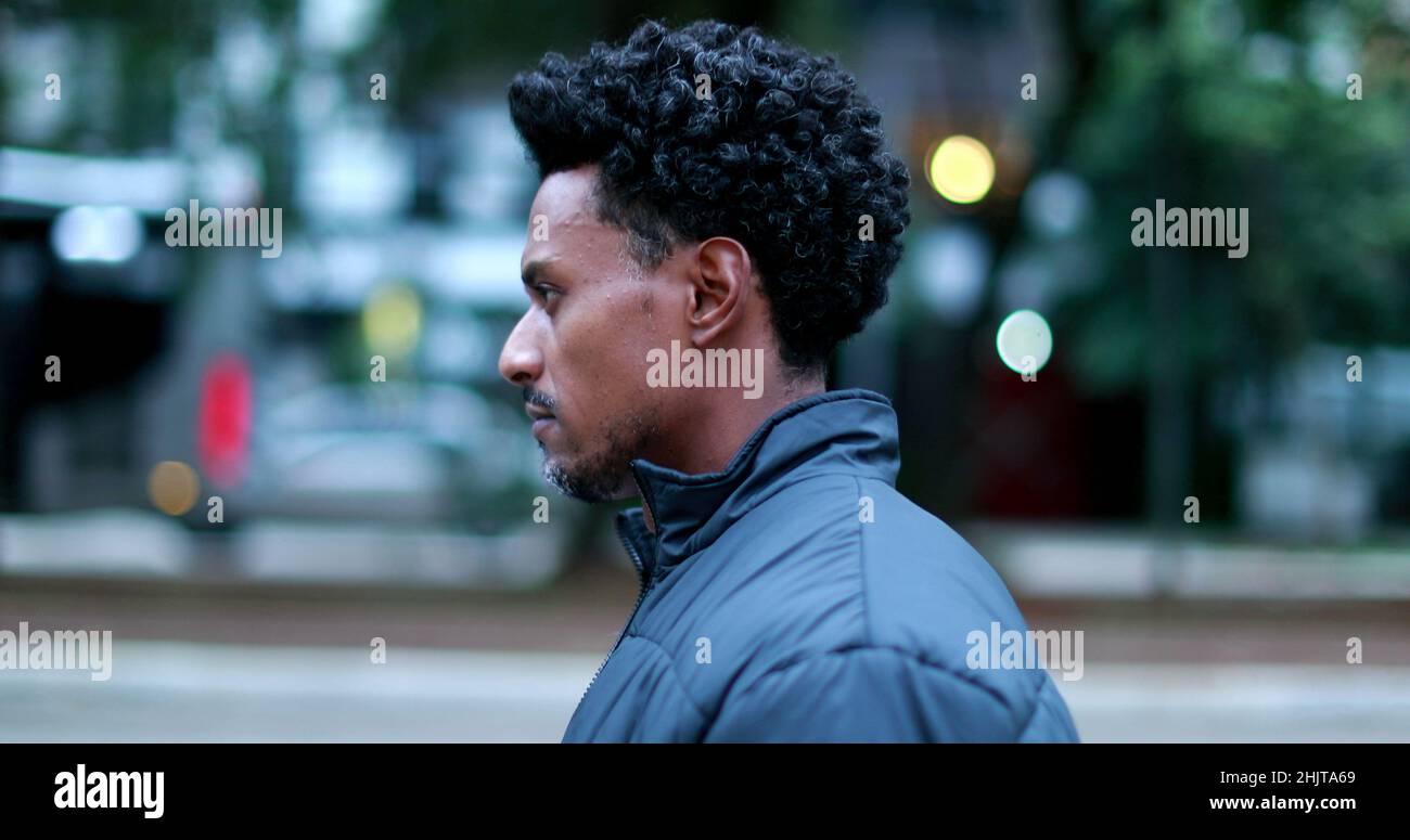 Side of black man walking in city, african american person moving ...