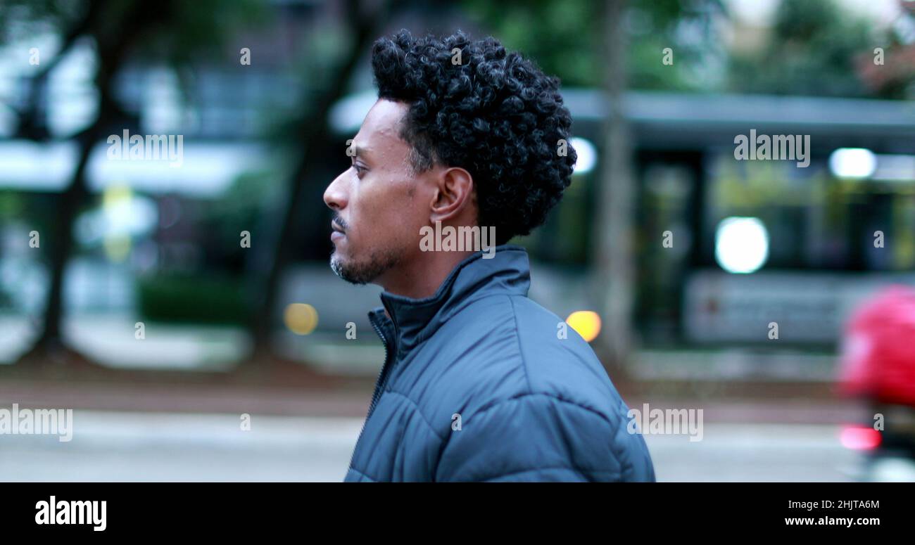Confident african man walking forward hi-res stock photography and ...