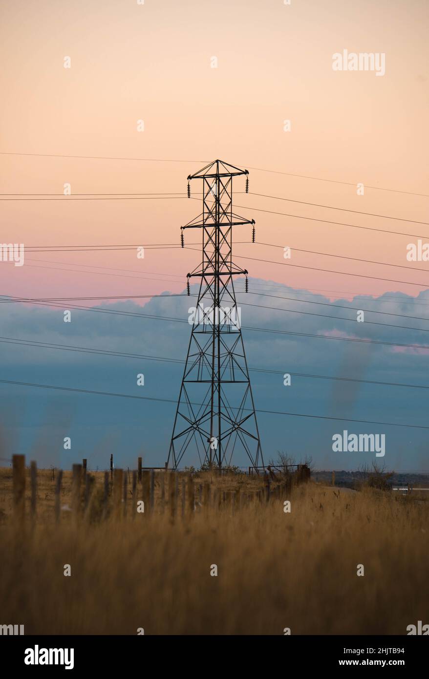 Power cable in Colorado during the sunset Stock Photo - Alamy