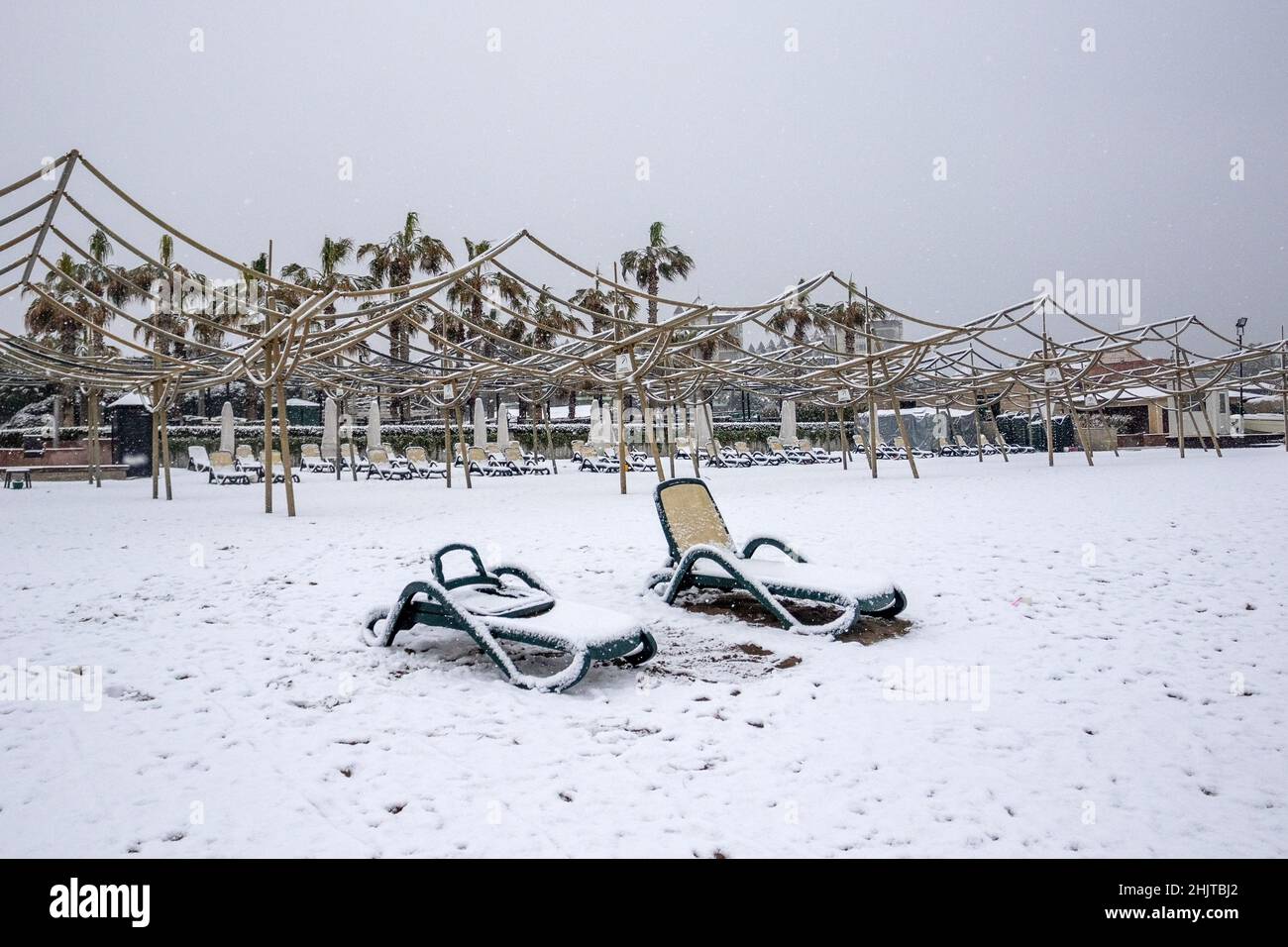 Heavy snowfall on the Mediterranean coast. Snow storm and white covered ...