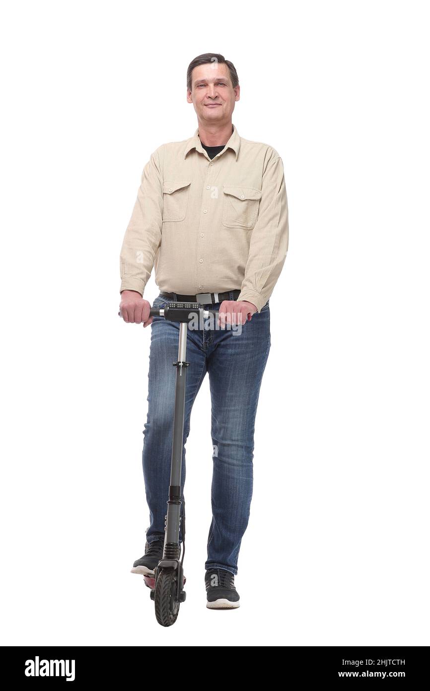 Full length portrait of an young man riding a scooter Stock Photo - Alamy