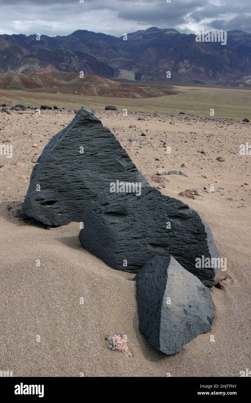 Ventifacts and sand, Death Valley National Park, California. Ventifacts ...