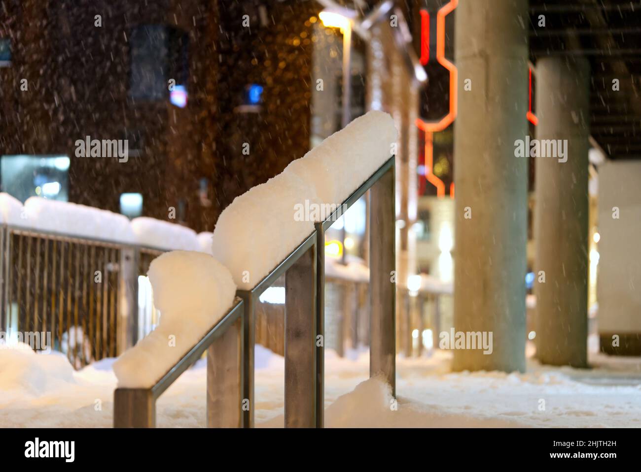 Snow on the railing stairs in winter time in the city Stock Photo - Alamy