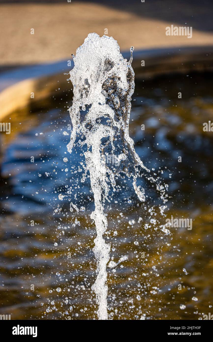 Vertical shot of water sprout with droplets from a fountain Stock Photo ...