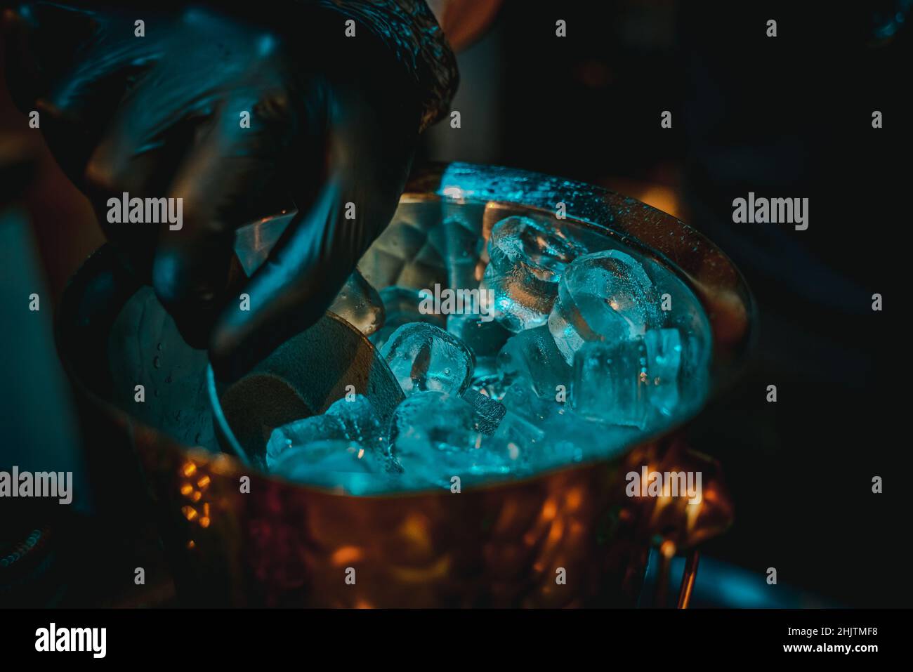 Dark blue bucket of ice background hi-res stock photography and images ...