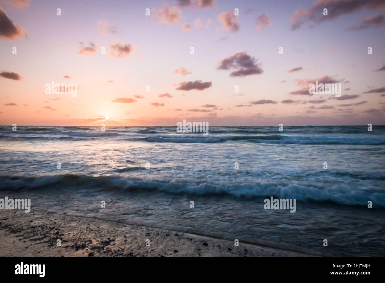 Caribbean Sea at sunset, Grand Cayman, Cayman Islands Stock Photo - Alamy