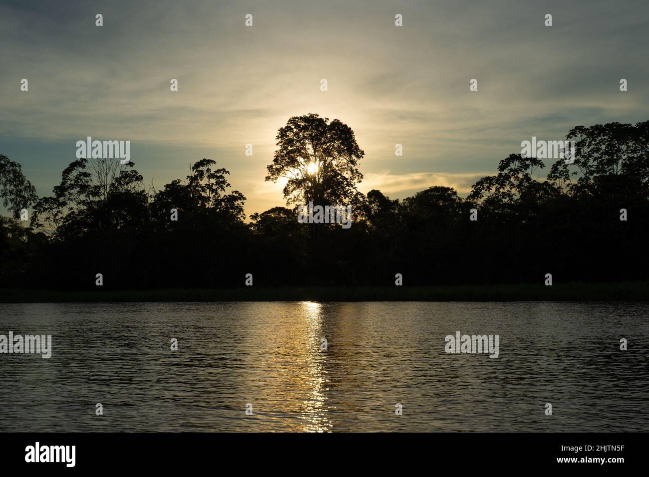 Sunset over the amazon river. At the community of Gamboa next to the ...