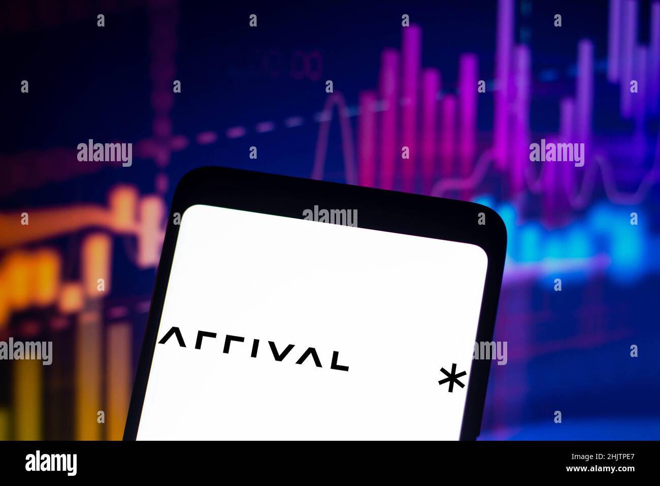 In this photo illustration the Arrival logo seen displayed on a ...