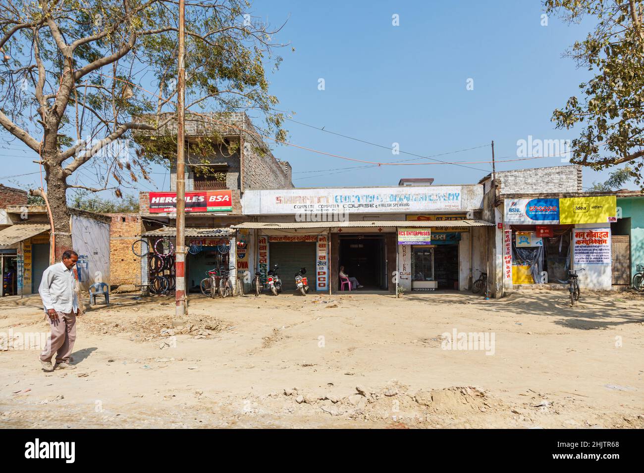 Roadside shops in a village approaching Varanasi (formerly Banaras or ...