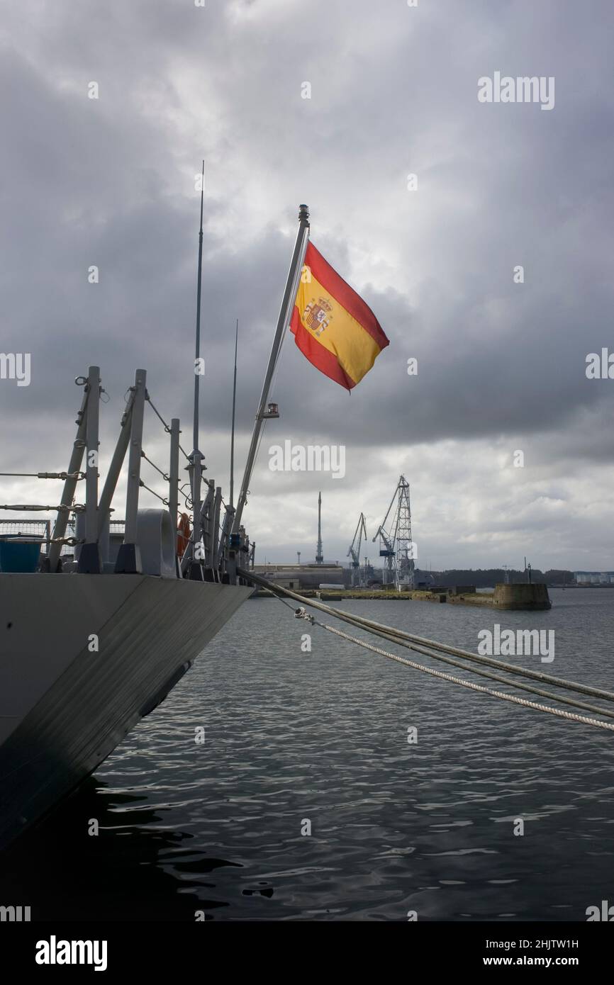 The flag of Spain on a ship of the Spanish navy in the port of the ...