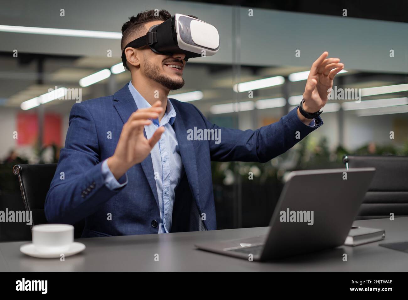 Man sitting using vr hi-res stock photography and images - Alamy