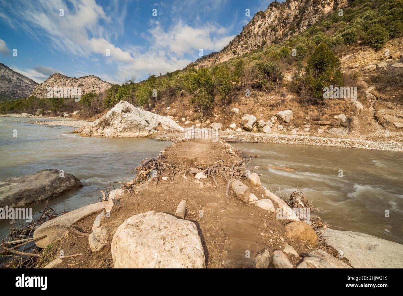 Beautiful view of the concrete pathway across the river Stock Photo - Alamy