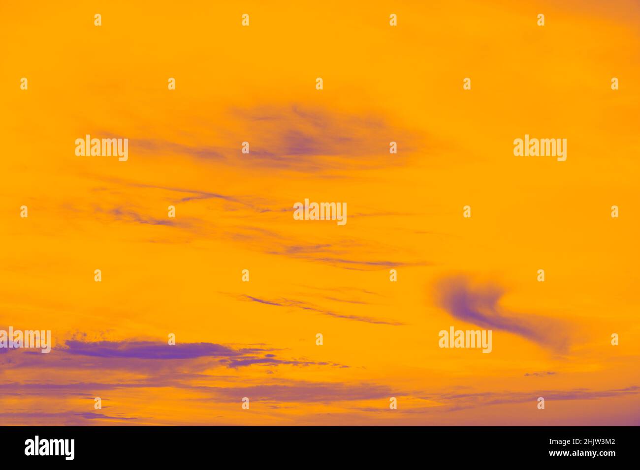 Yellow sky with blue clouds . Abstract colored heaven Stock Photo - Alamy