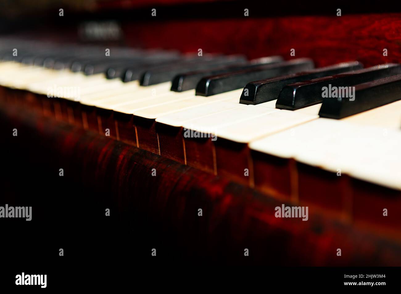 Ivory piano keys . Old piano keyboard Stock Photo - Alamy