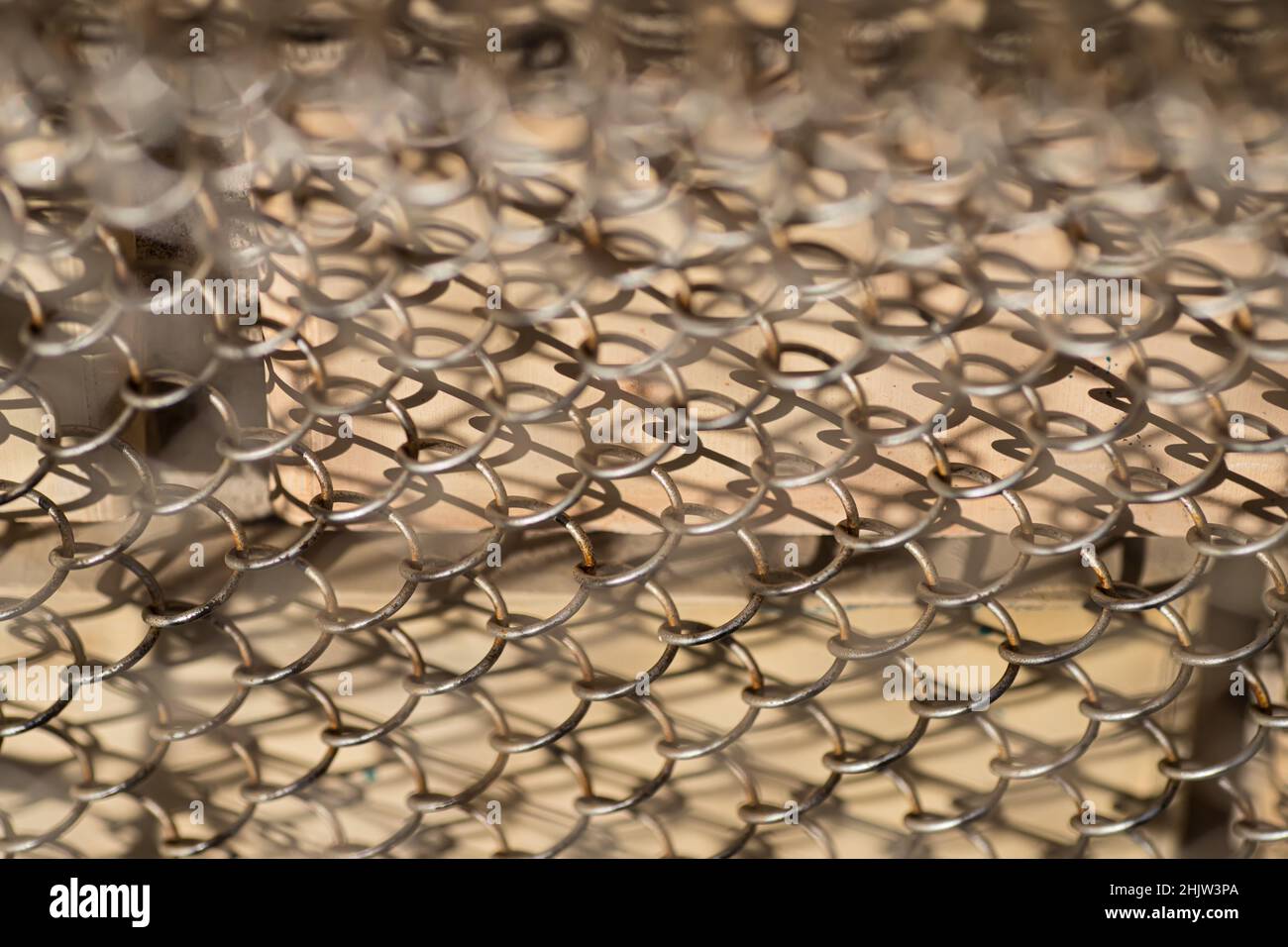 Mesh rabitz , texture of weaving mesh network link. Close up of a fence ...