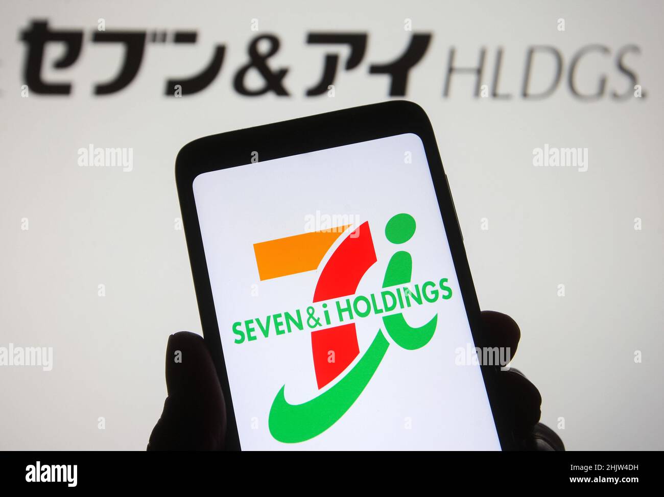 In this photo illustration, a Seven & i Holdings Co Ltd. logo is seen ...