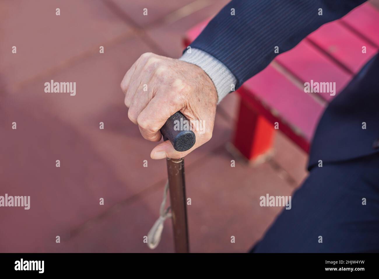 Old man hand holding walking stick outdoor Stock Photo - Alamy Old man hand holding walking stick outdoor Stock Photo - Alamy