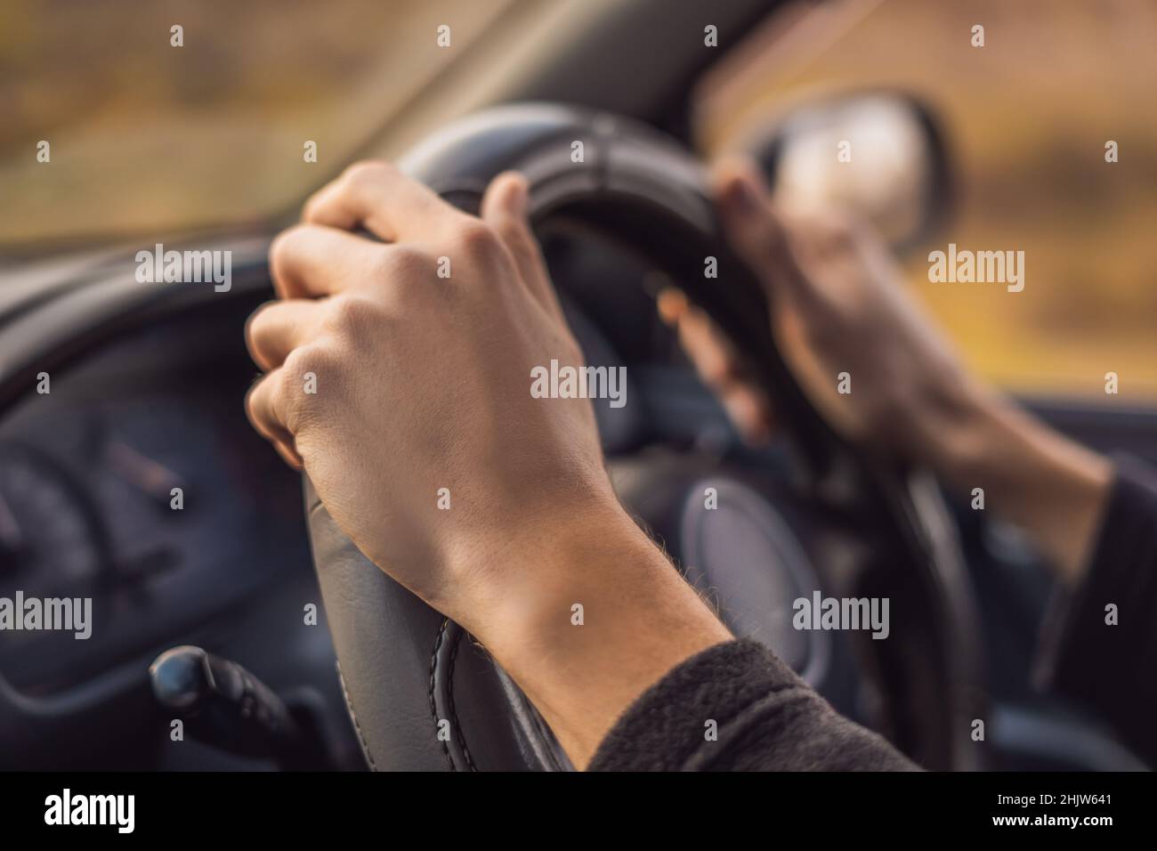 Drivers hand holding steering wheel hi-res stock photography and images ...
