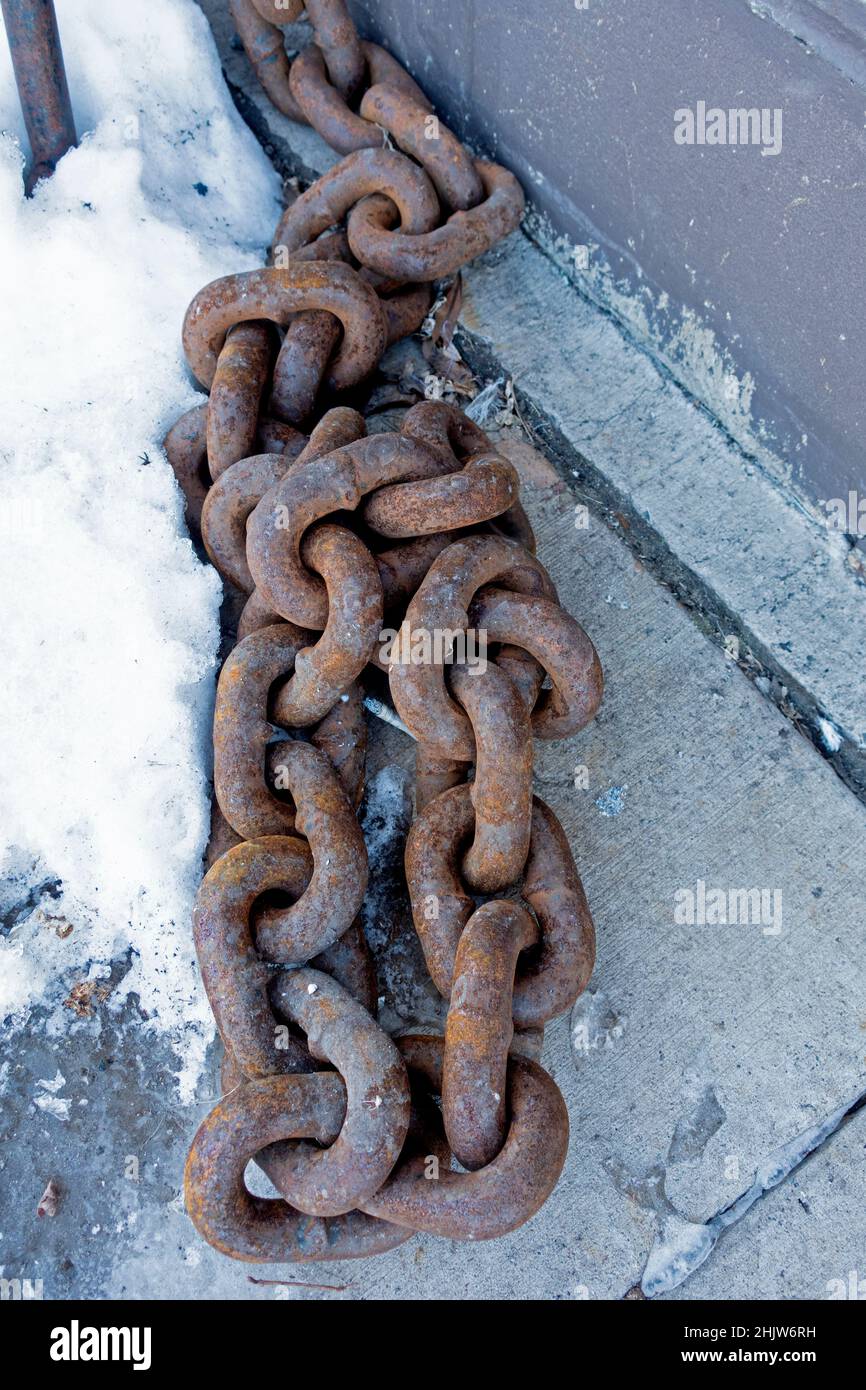 Found this rusted heavy duty anchor chain hooked to a pole outside The ...