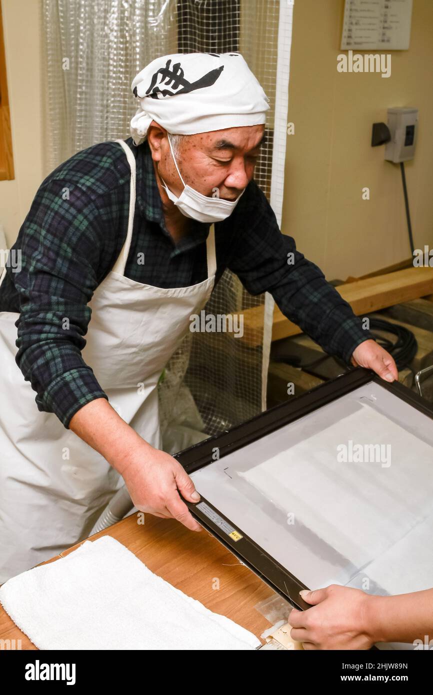 iida, nagano, japan, 2021/23/11 , local craftsman while producing ...