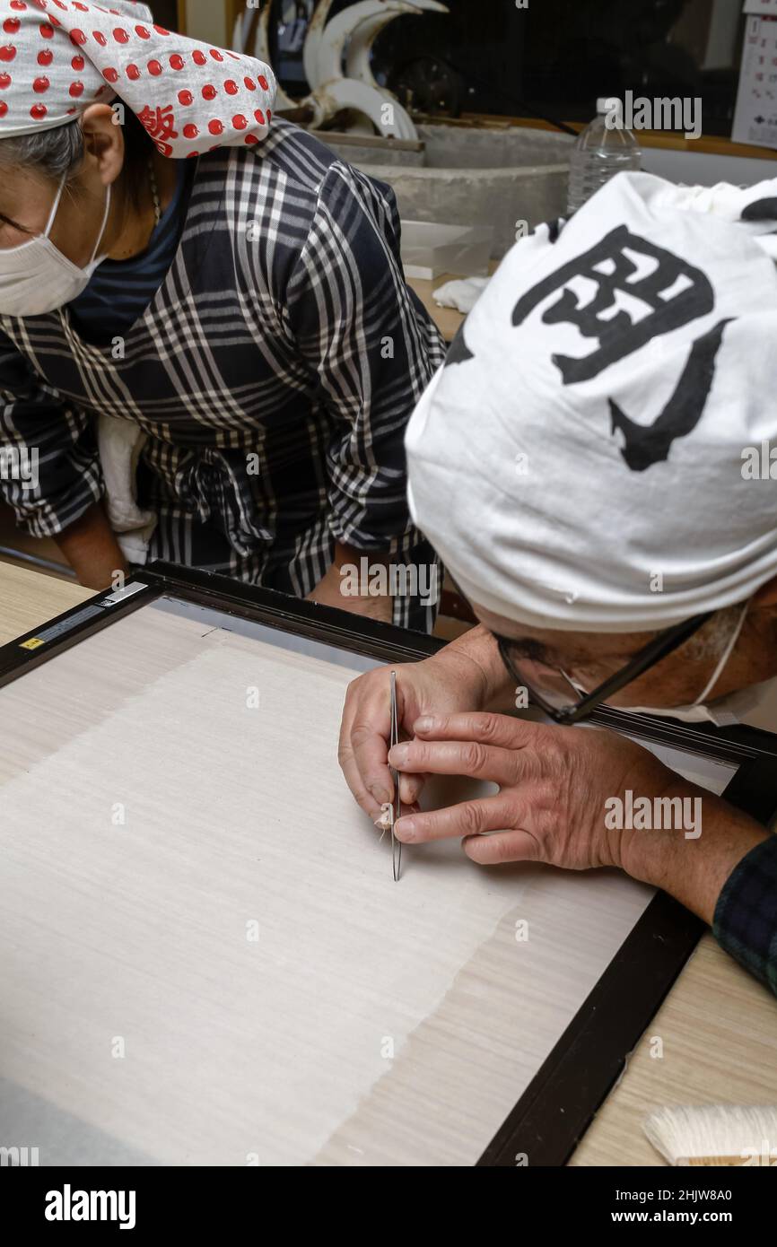 iida, nagano, japan, 2021/23/11 , local craftsman while producing ...