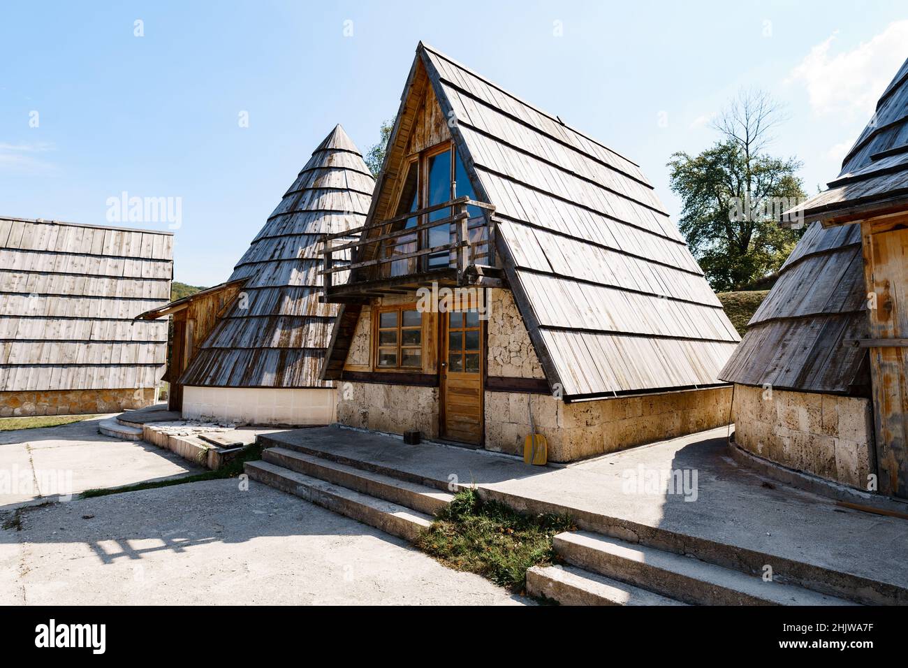 Triangular and conical houses on a concrete site. Montenegro Stock ...