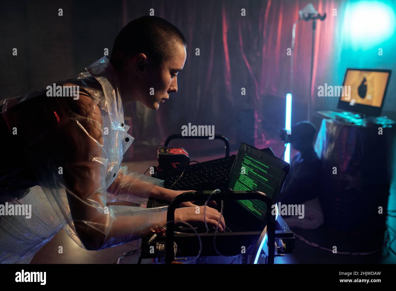 Hacker typing on futuristic computer hi-res stock photography and ...