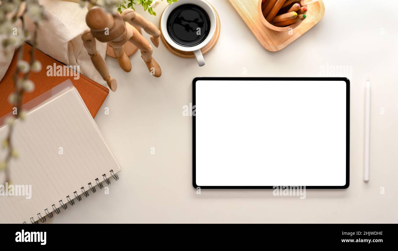 College study table top view with stationery, decor and digital tablet ...