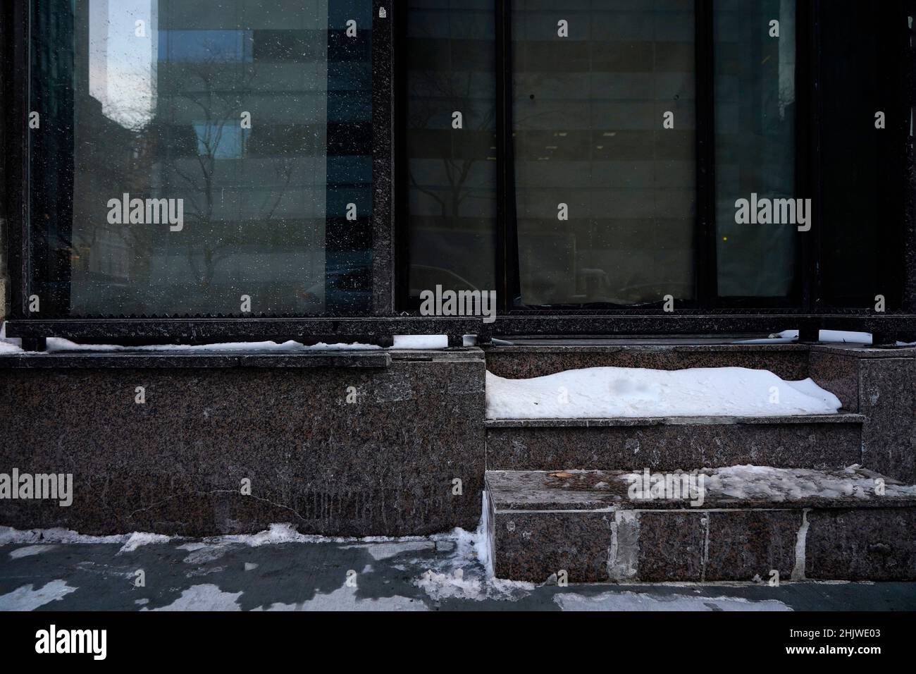 A closed storefront is seen in Lower Manhattan on January 31, 2022 in ...