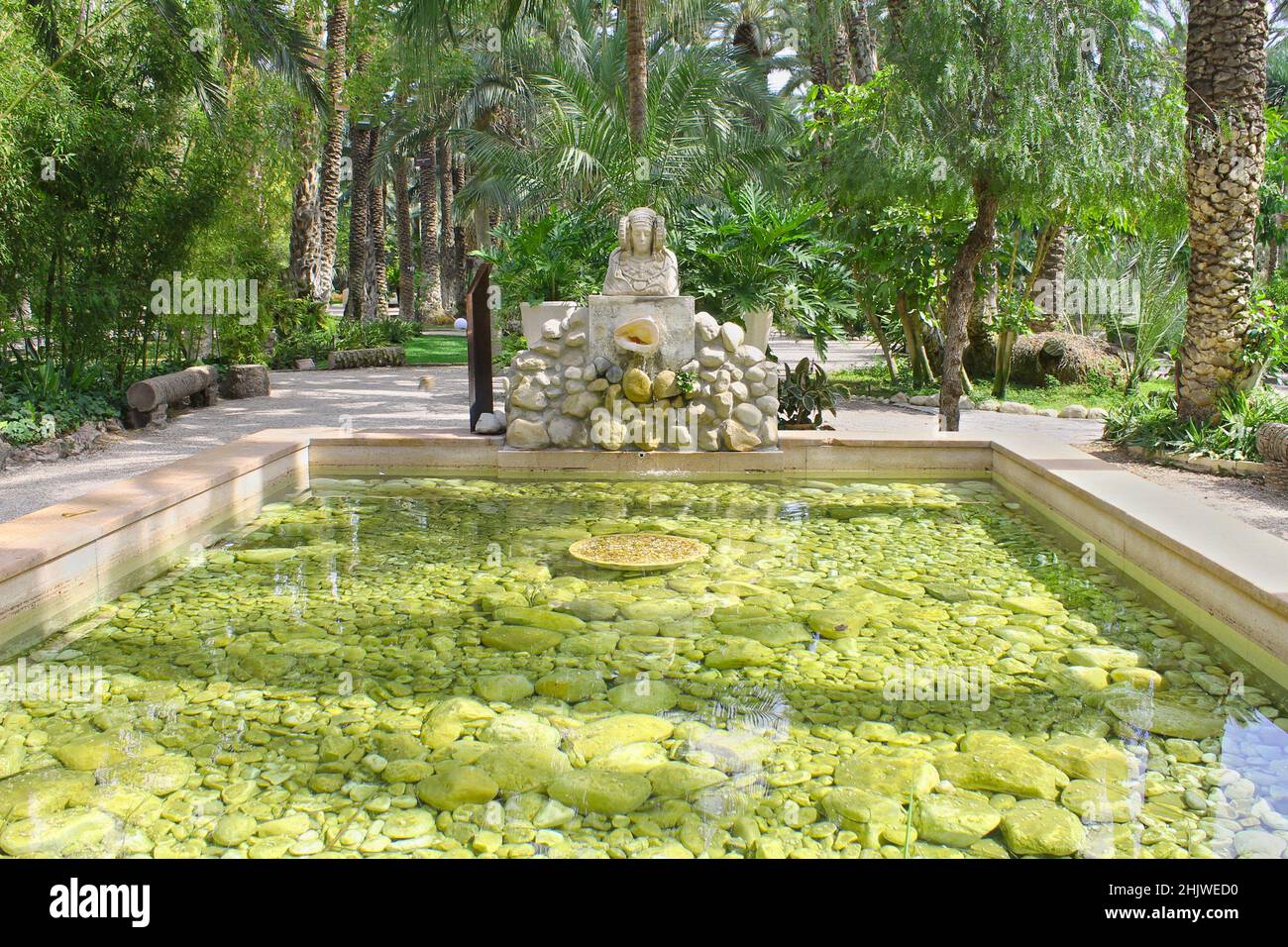 Statue of Lady of Elche in Elche's Huerto Del Cura botanical garden on ...