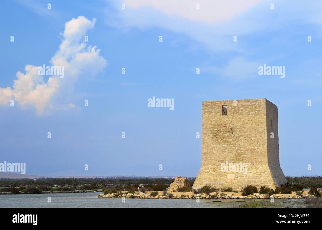 Salt flats and the tower of Tamarit in Santa Pola, province of Alicante ...