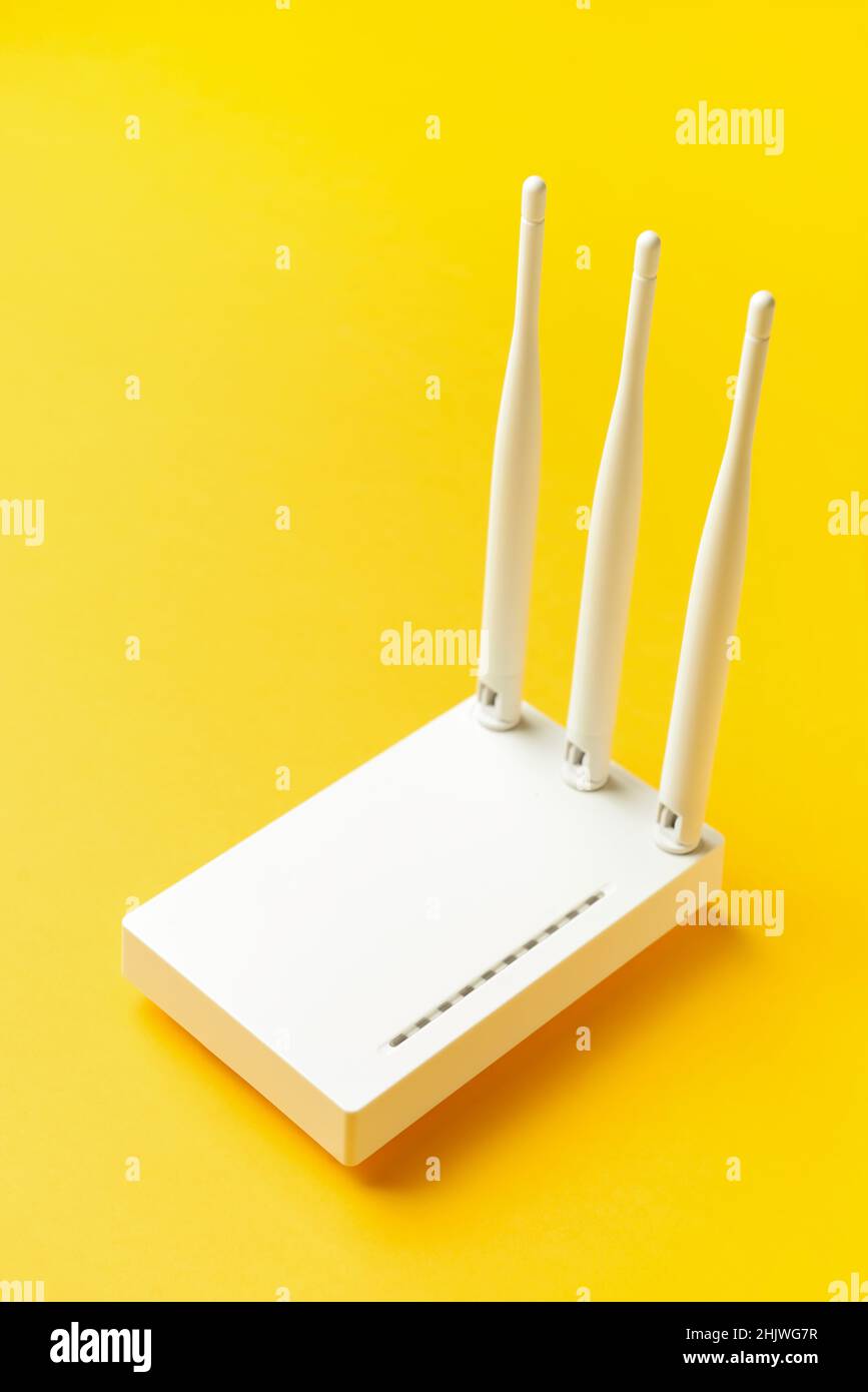 White wi-fi router on color background Stock Photo - Alamy