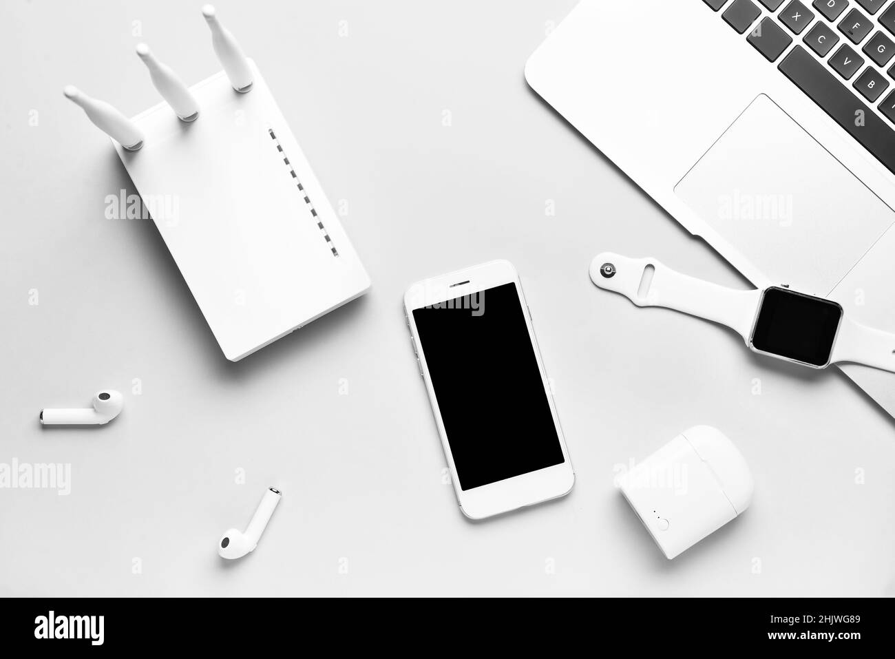 Different gadgets on light background Stock Photo - Alamy