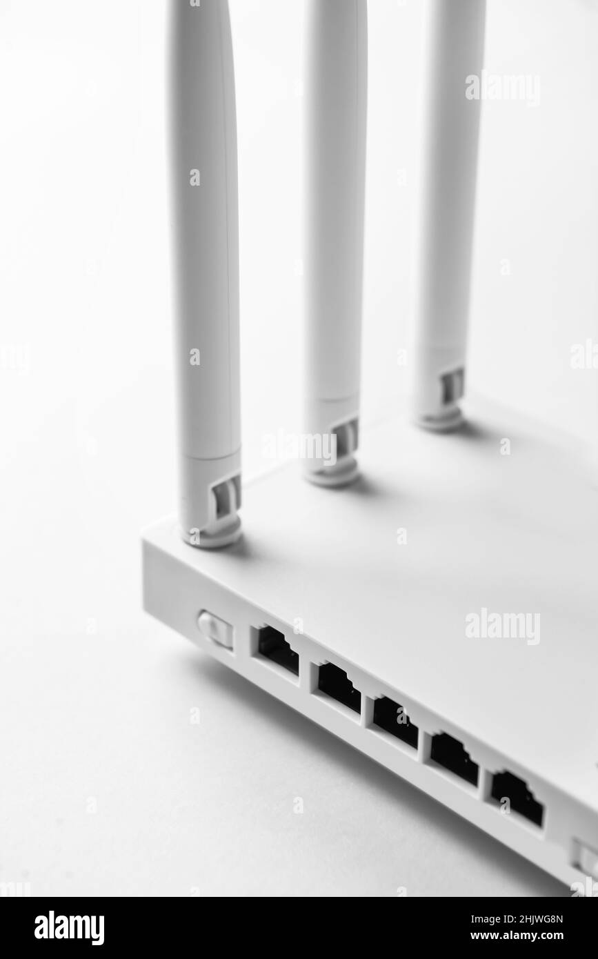 Wi-Fi router with antennas on light background Stock Photo - Alamy